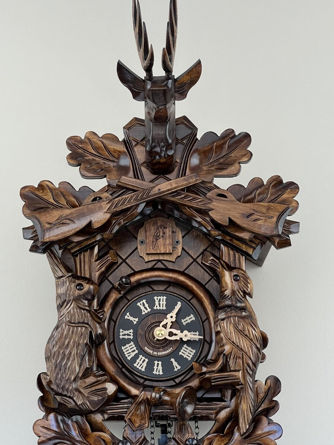 Hunter's Cuckoo Clock with Hand-carved Oak Leaves, Bunny, Bird, and Cr
