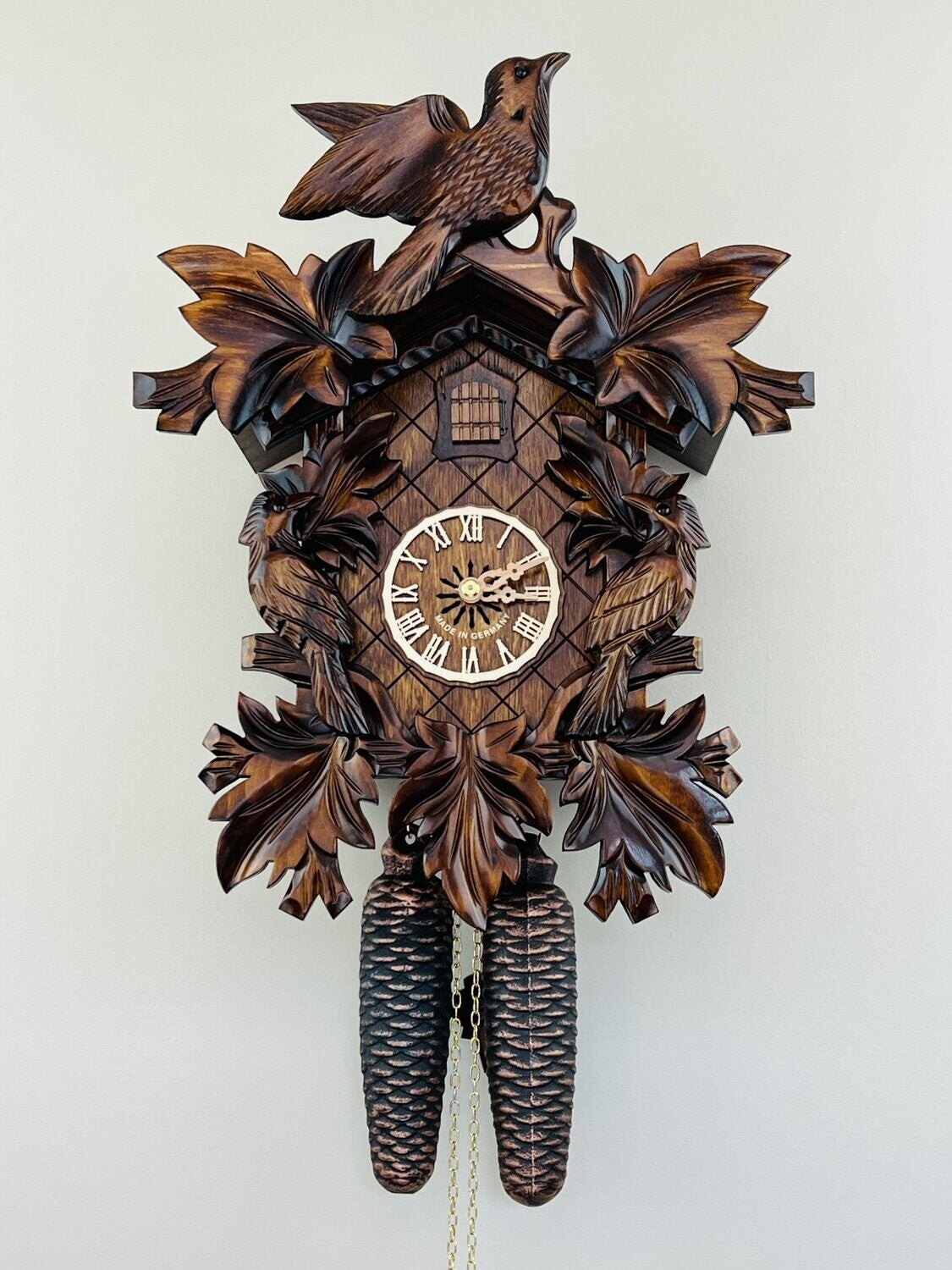 Eight Day Cuckoo Clock with Three Hand-carved Birds and Seven Leaves